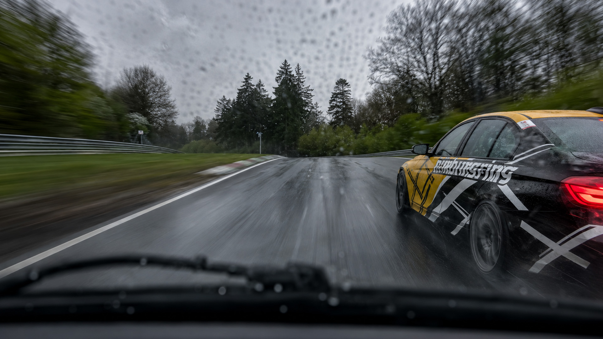 Bad Tyres Alfa Romeo Almost Hits Car on Wet Nürburgring