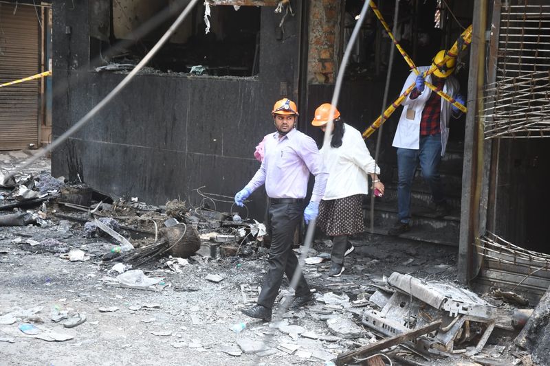 Delhi blaze: Hotel building owner arrested after Malviya Nagar fire ...