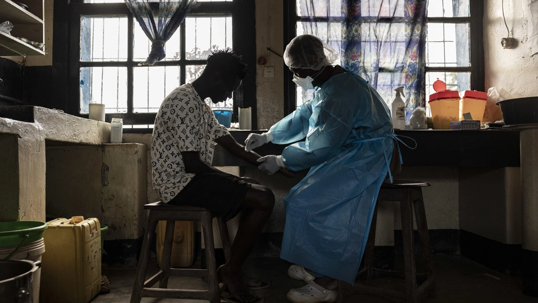 WHO sharply lowers Ebola case count as Uganda border stays shut