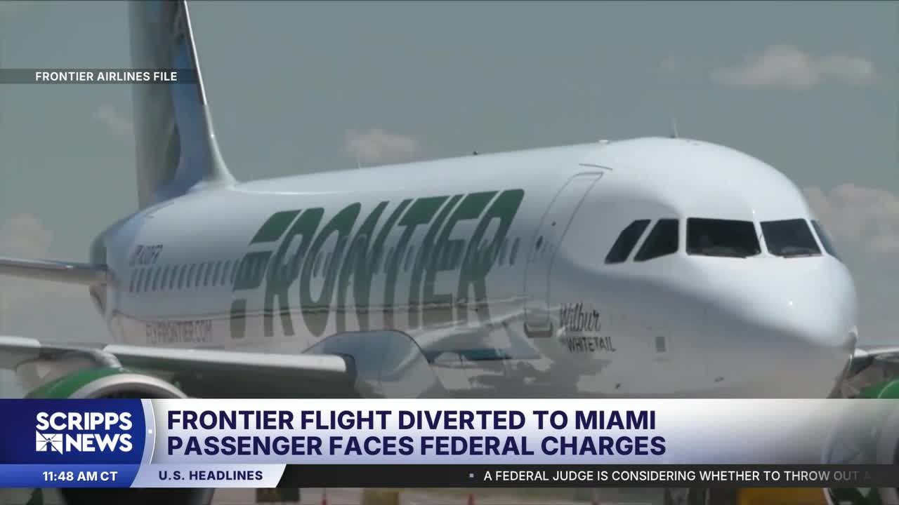 Frontier passenger chokes off-duty attendant after trying to enter cockpit
