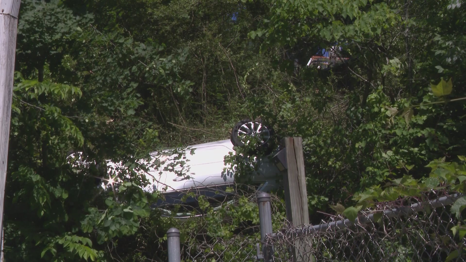 Woman injured after car goes over hillside in Charleston