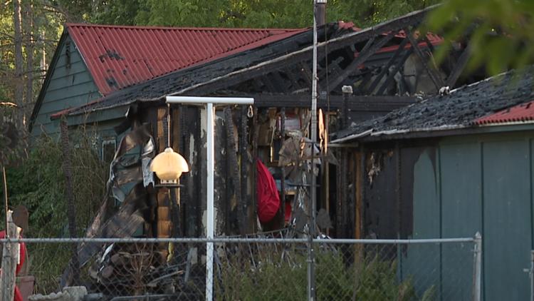 Man killed in Davenport house fire, woman and child rescued