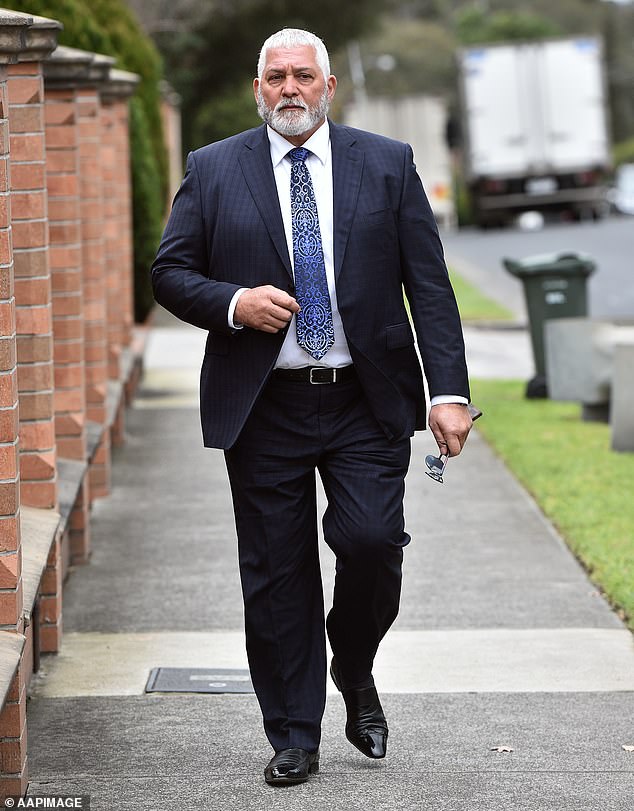 Mick Gatto is spotted outside his beachside Melbourne mansion following ...