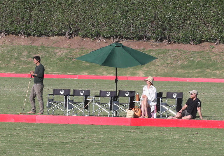 Prince Harry goes casual at polo match as Meghan Markle and kids stay home