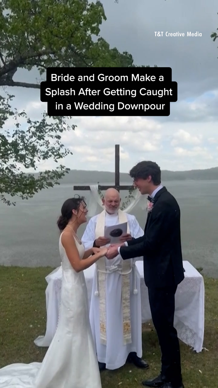 Bride and groom make a splash after getting caught in a wedding downpour