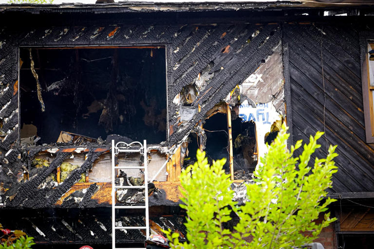 1 treated for minor burns after structure fire near Powers Boulevard