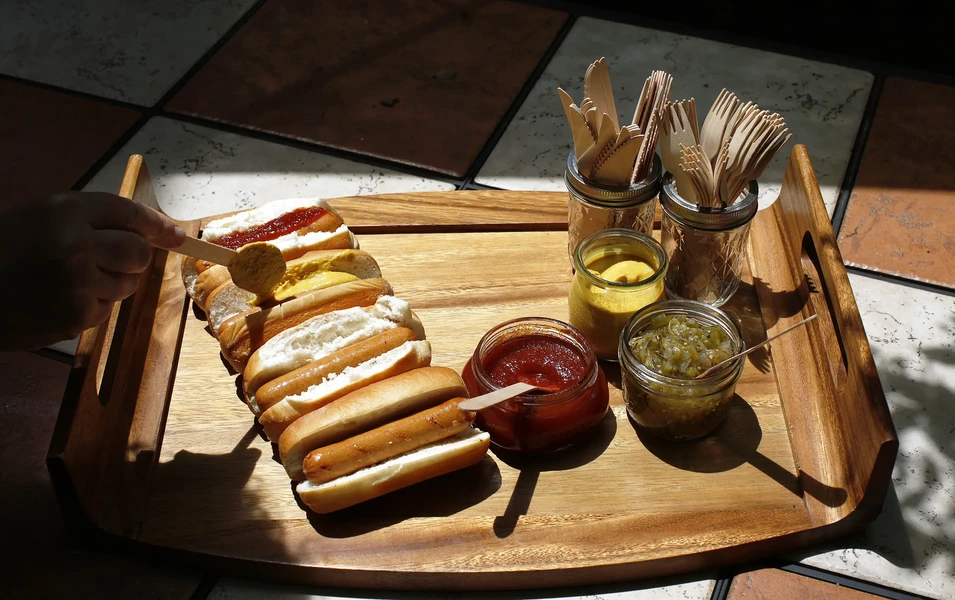 Slow cooker party hot dogs offer easy summer crowd-pleaser