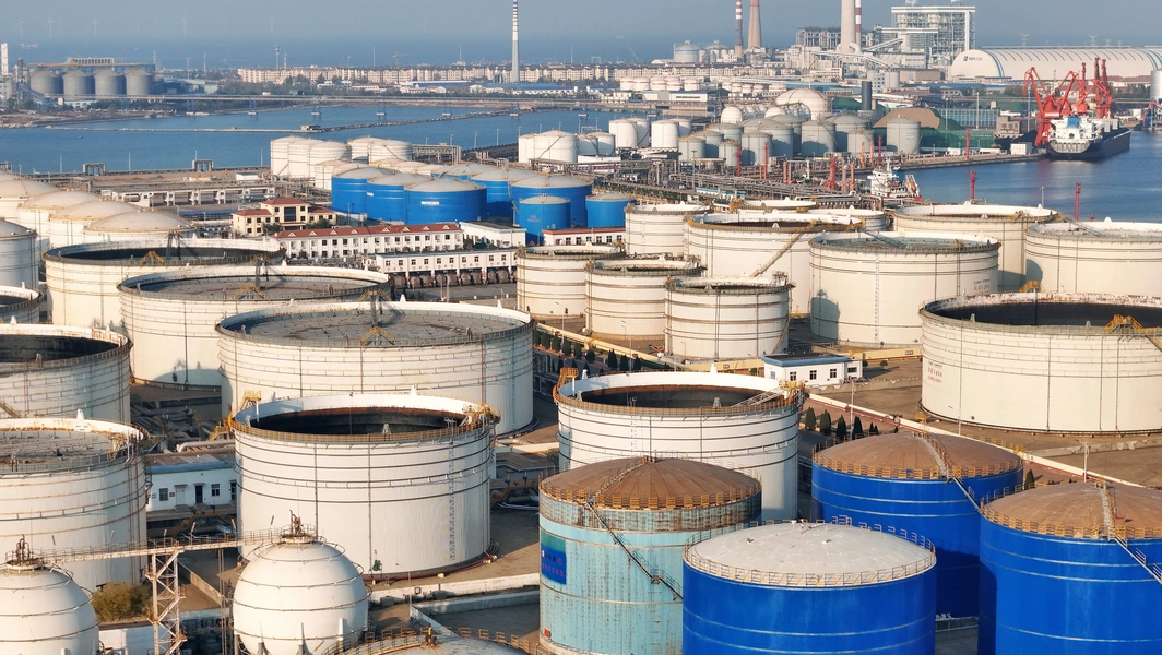 China halves oil imports as reserves mask supply shock
