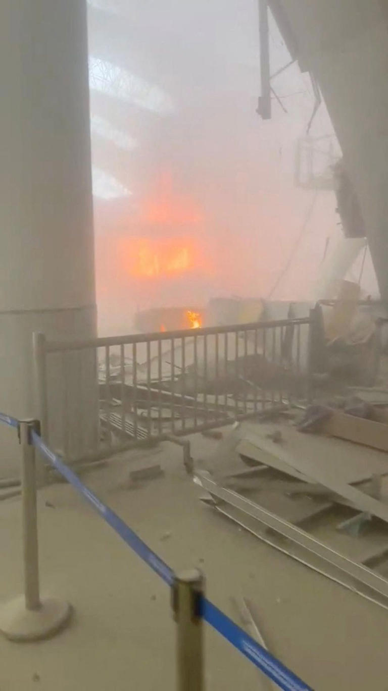 Kuwait airport ablaze after Iranian drone strike in major ceasefire ...