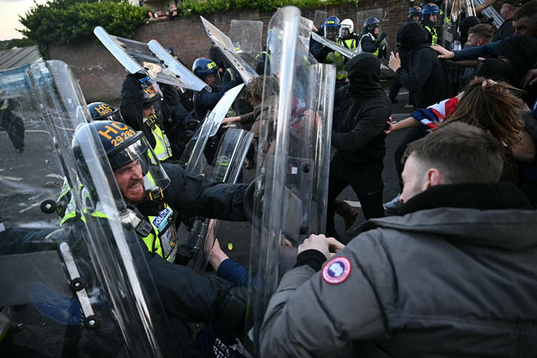 UK prime minister condemns violent protests as police face criticism ...