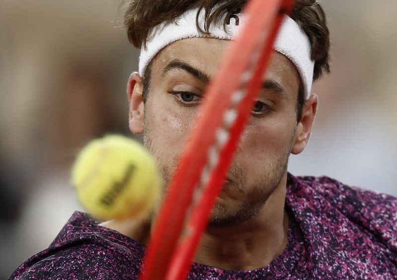 Tennis-Cobolli taps Nadal shower power in superstitious French Open run