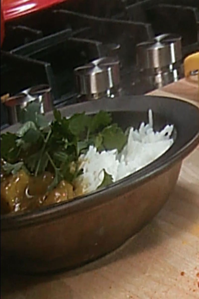 Chicken coconut curry with rice and cilantro