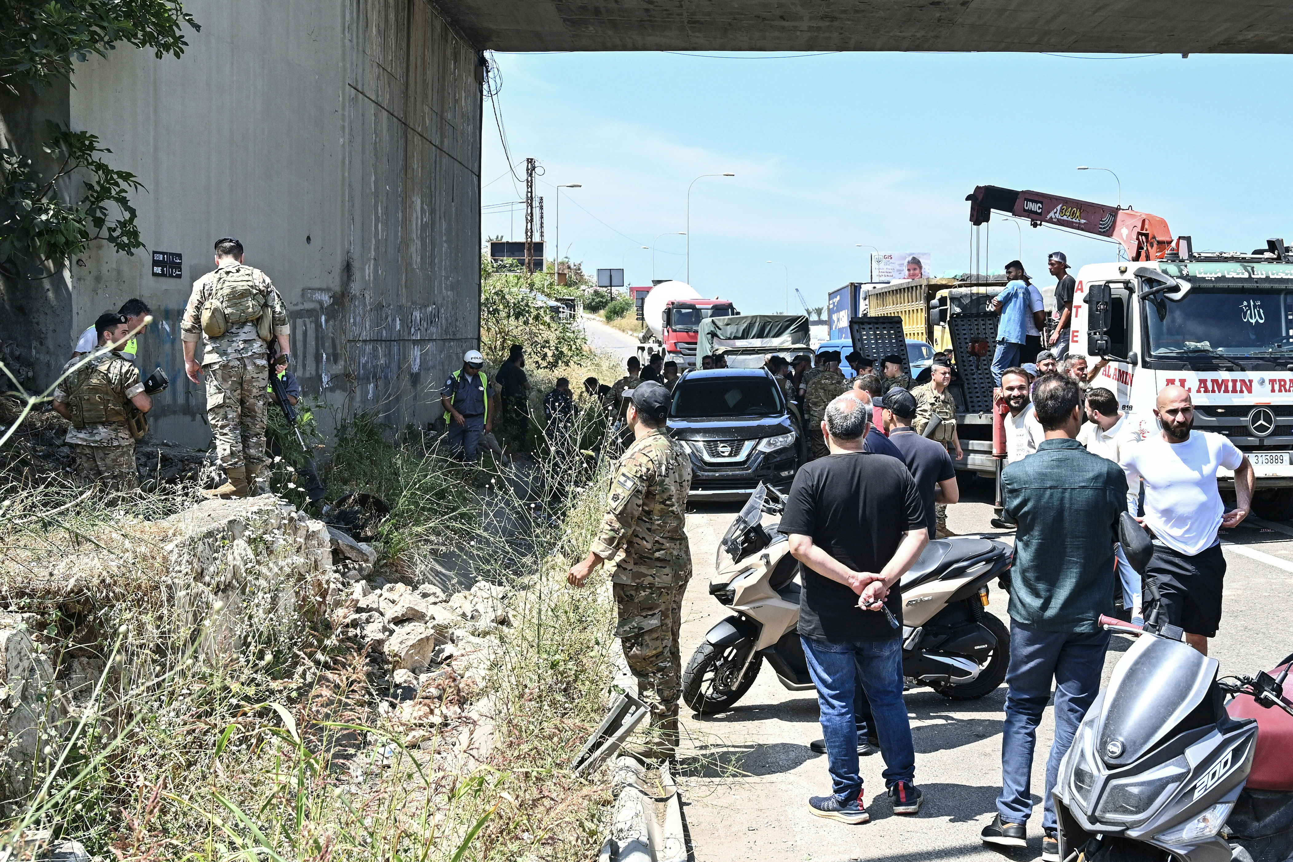 Israeli attacks kill nine in Lebanon, reach Beirut outskirts