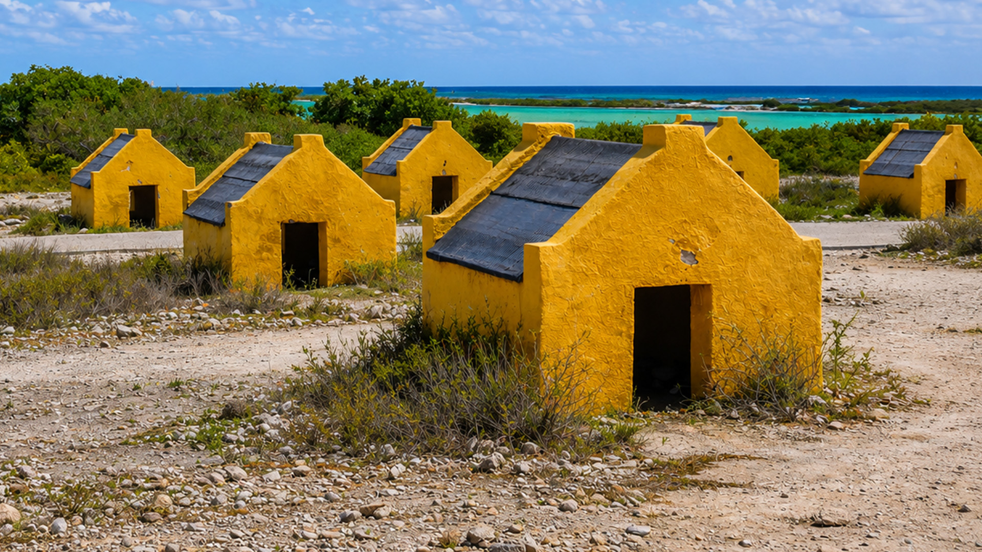 What’s the story behind these bright yellow huts by the sea?