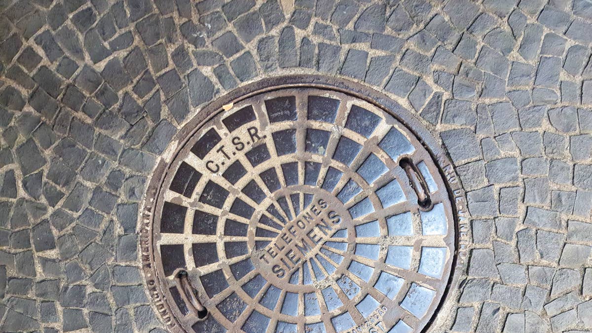 Watch: 31-year-old woman rescued after falling into manhole in Rio de ...
