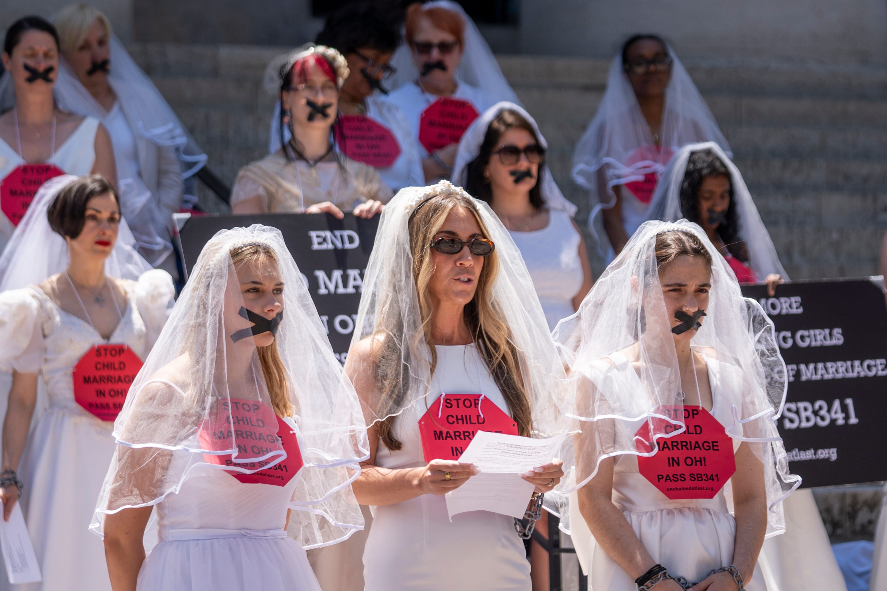 Protesters in bridal gowns push for Ohio to ban child marriage