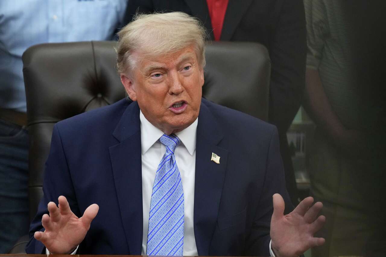 President Trump signs executive order on AI. Here's what to know
