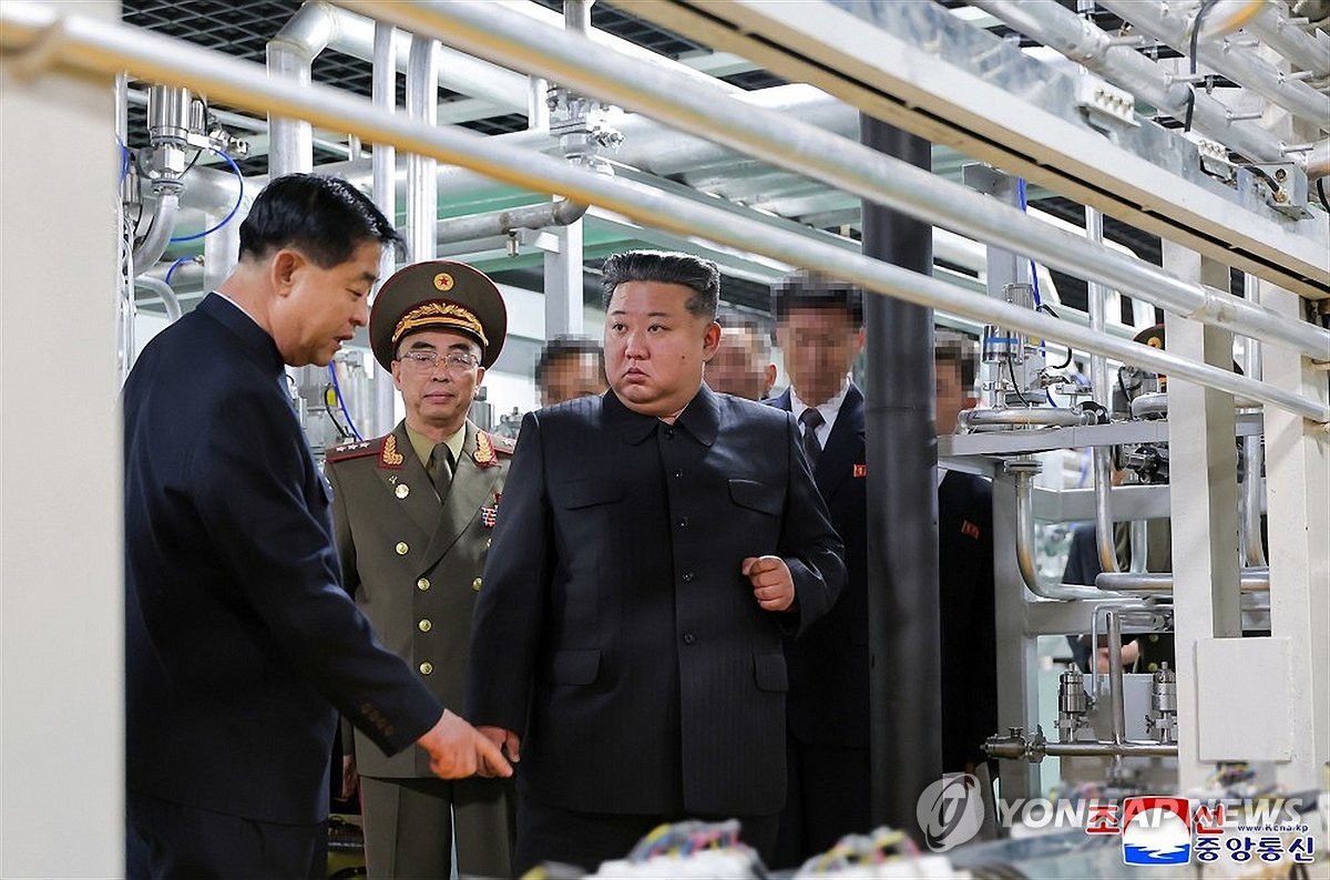 NK leader inspects new nuclear material production facility