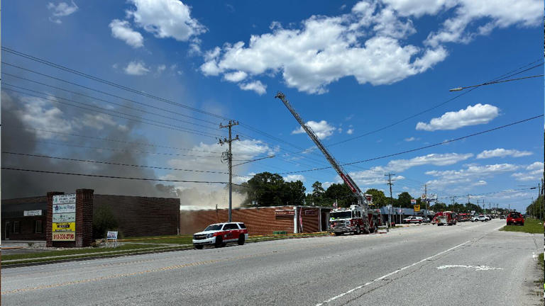 Furniture warehouse fire shuts down major street in Jacksonville