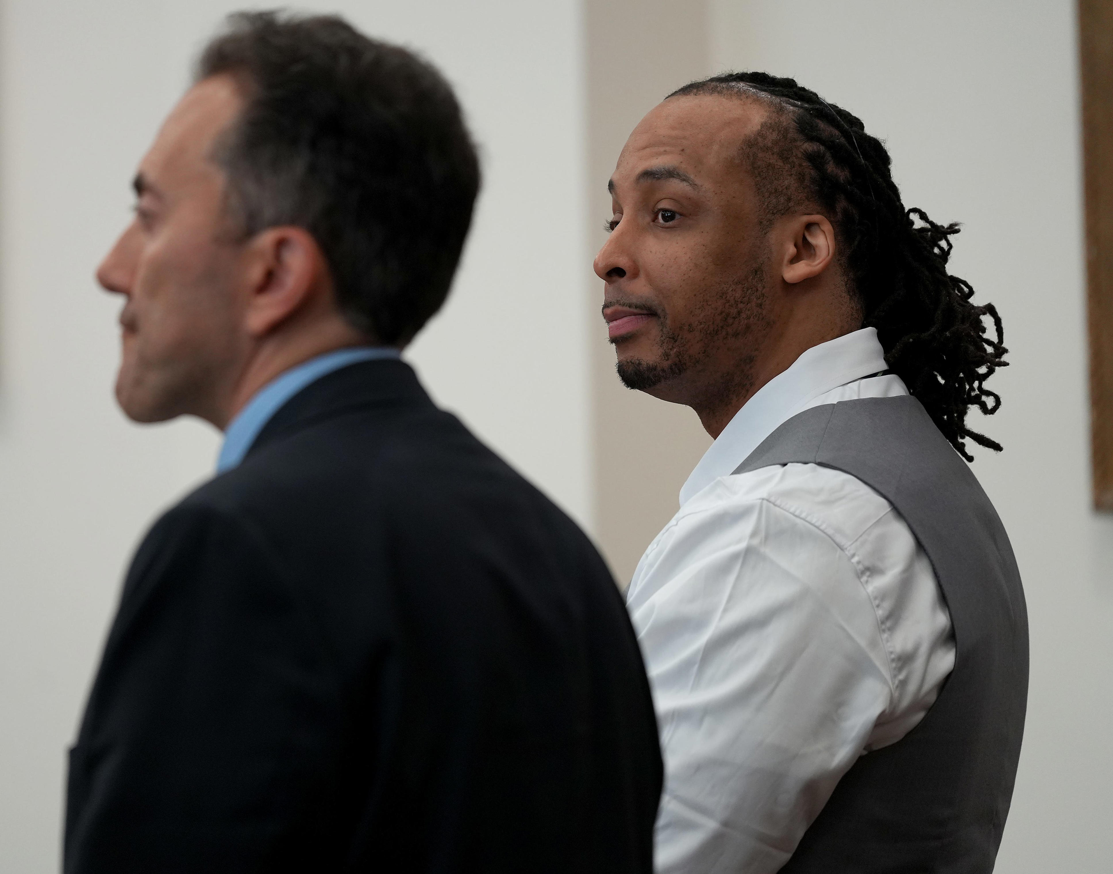 Defense in homicide trial focuses on trajectory of bullet wounds