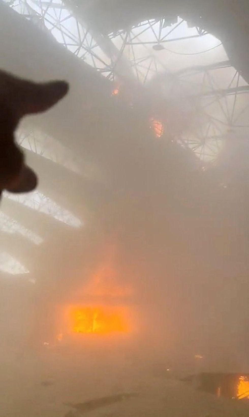 Kuwait airport ablaze after Iranian drone strike in major ceasefire ...