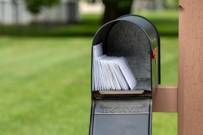 Grafton postal worker charged after allegedly stealing rebate checks ...