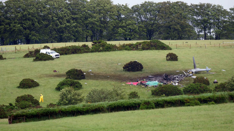 Three dead after Royal Navy helicopter crashes into field
