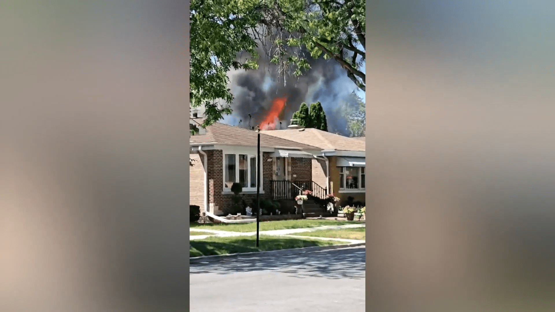 Large flames and plume of smoke rise from fire in Chicago, video shows
