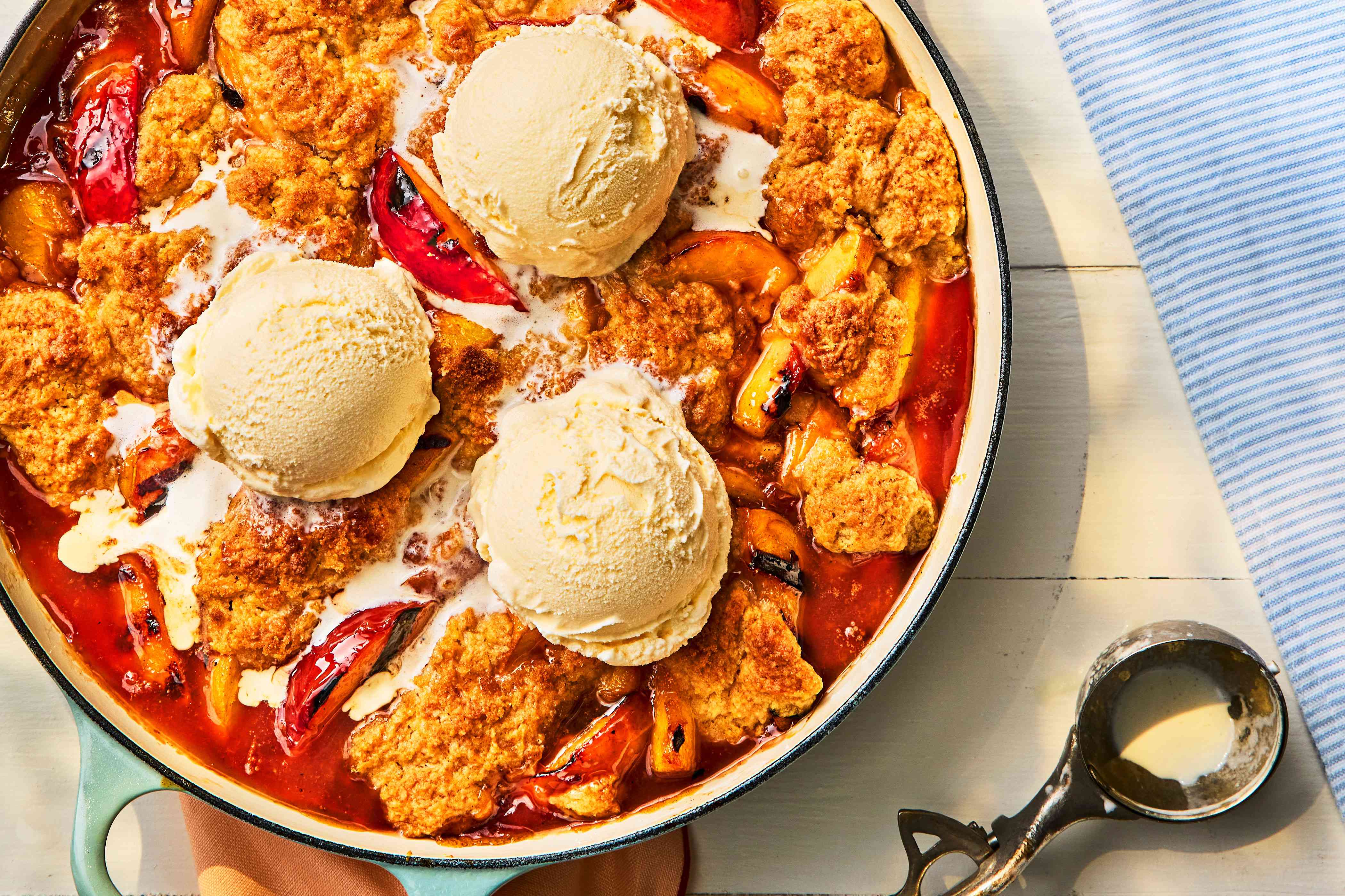 Why everyone is putting peach cobbler on the grill this summer