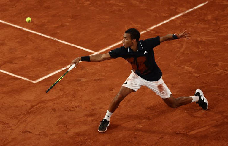 Tennis-Cobolli survives wind, suppresses Auger-Aliassime for Paris ...