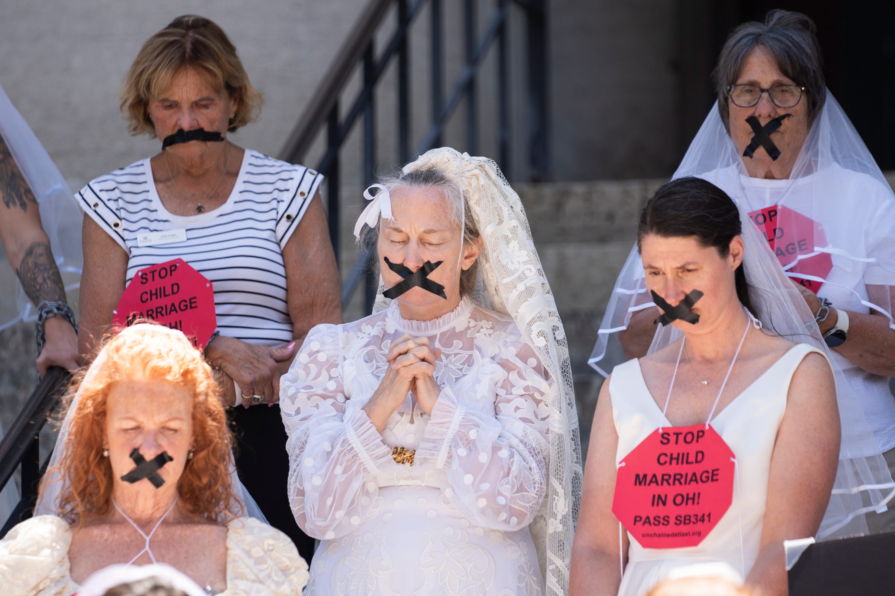 Protesters in bridal gowns push for Ohio to ban child marriage
