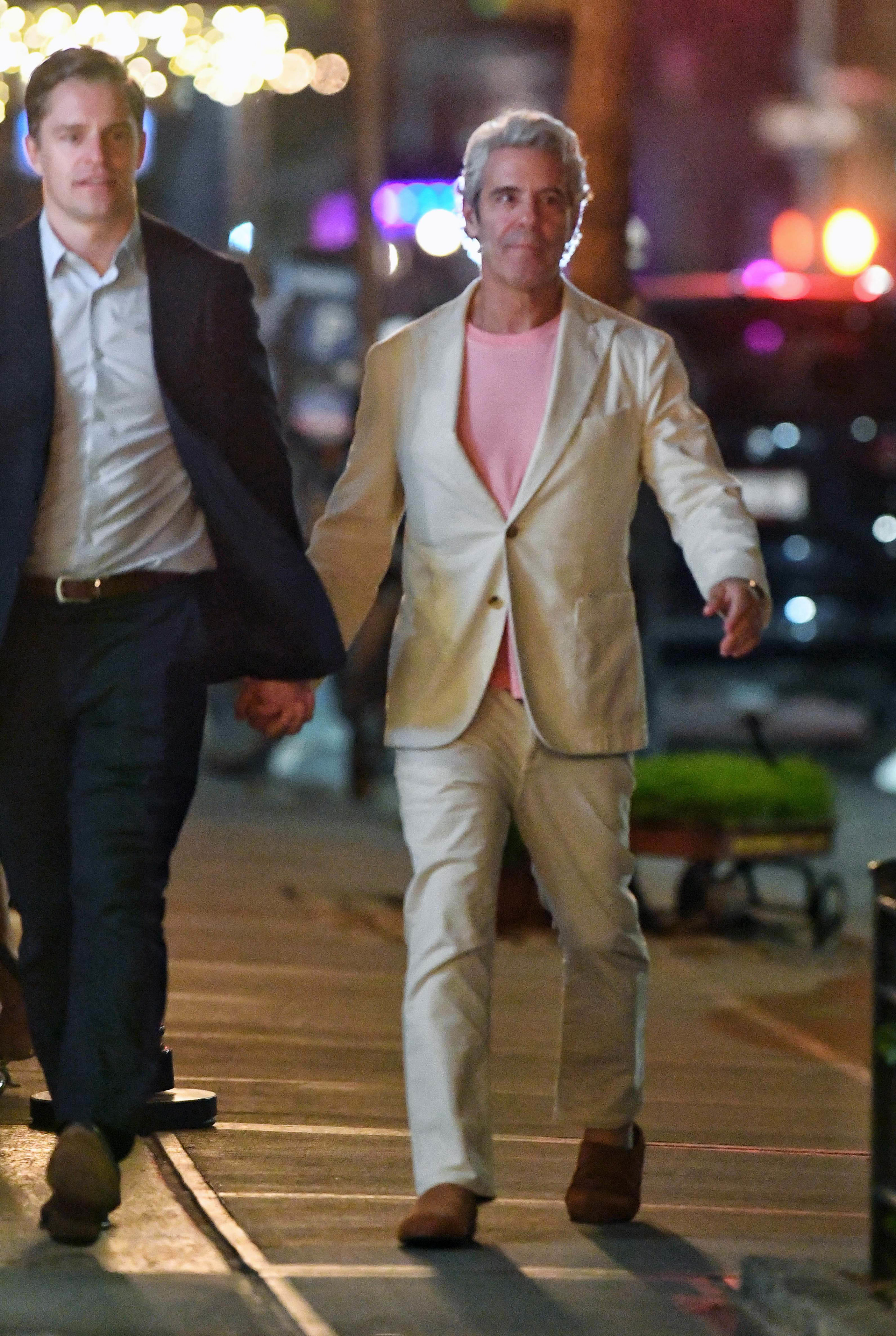 Andy Cohen holds hands with businessman Kevin Sobieski during NYC ...