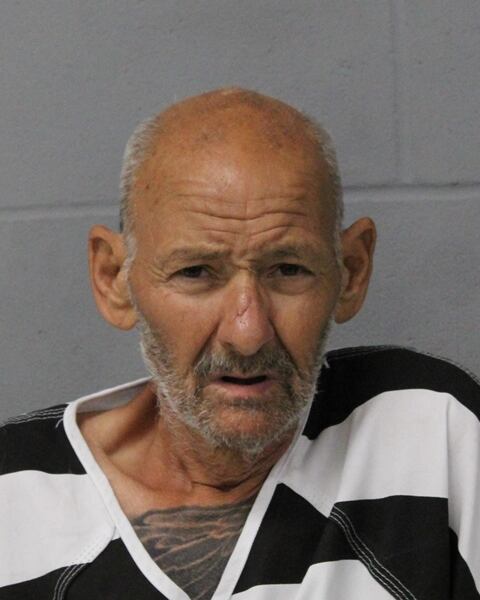 Arrest made in connection to body found in Austin trash can