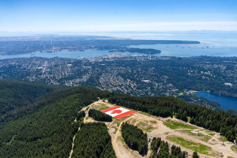 Grouse Mountain unveils giant Canadian flag as FIFA World Cup set to begin