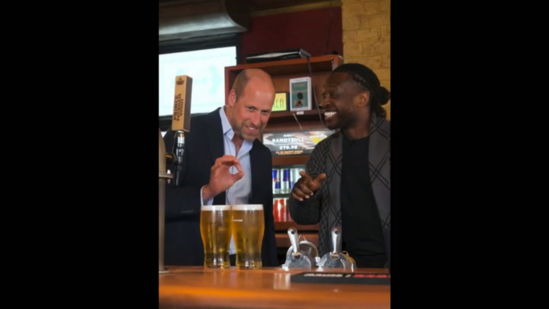 Prince William spotted pulling pints behind the bar at south London pub