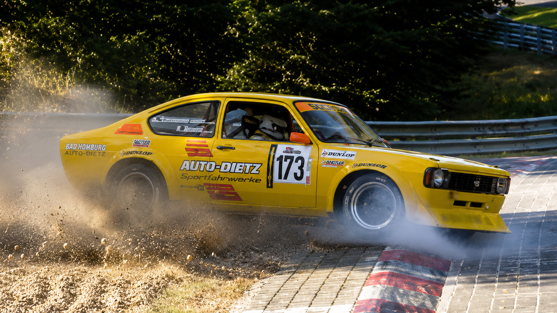 Classic race car survives massive slide on dangerous corner
