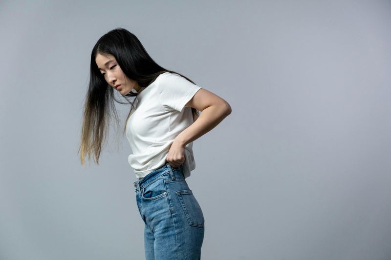 13 styling tricks that flatter a long torso instantly