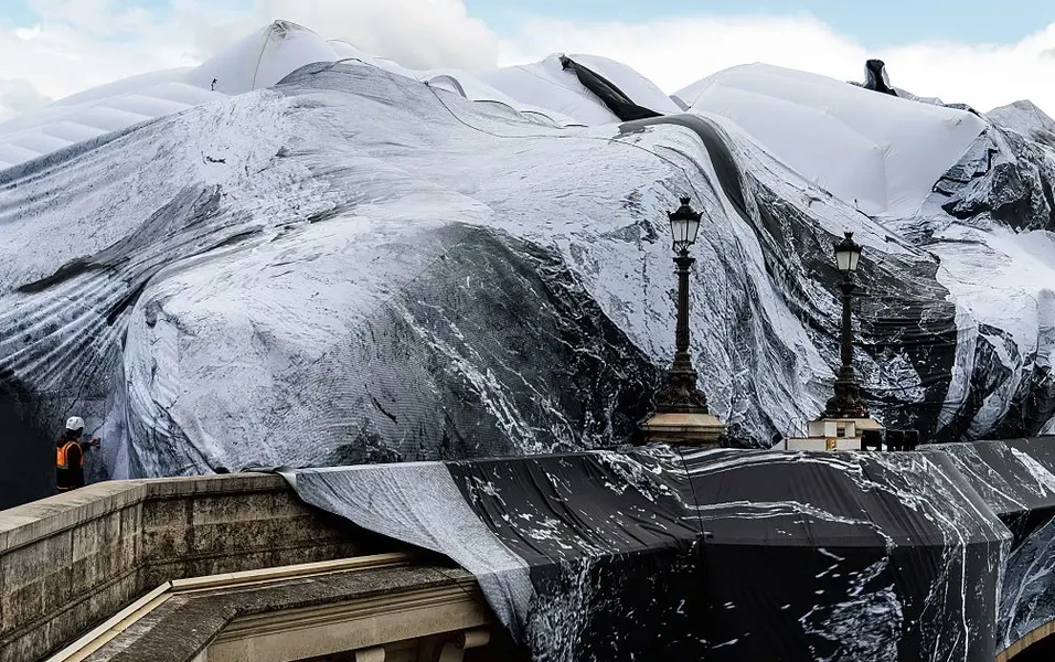 Storm damage delays JR's Pont Neuf art installation opening