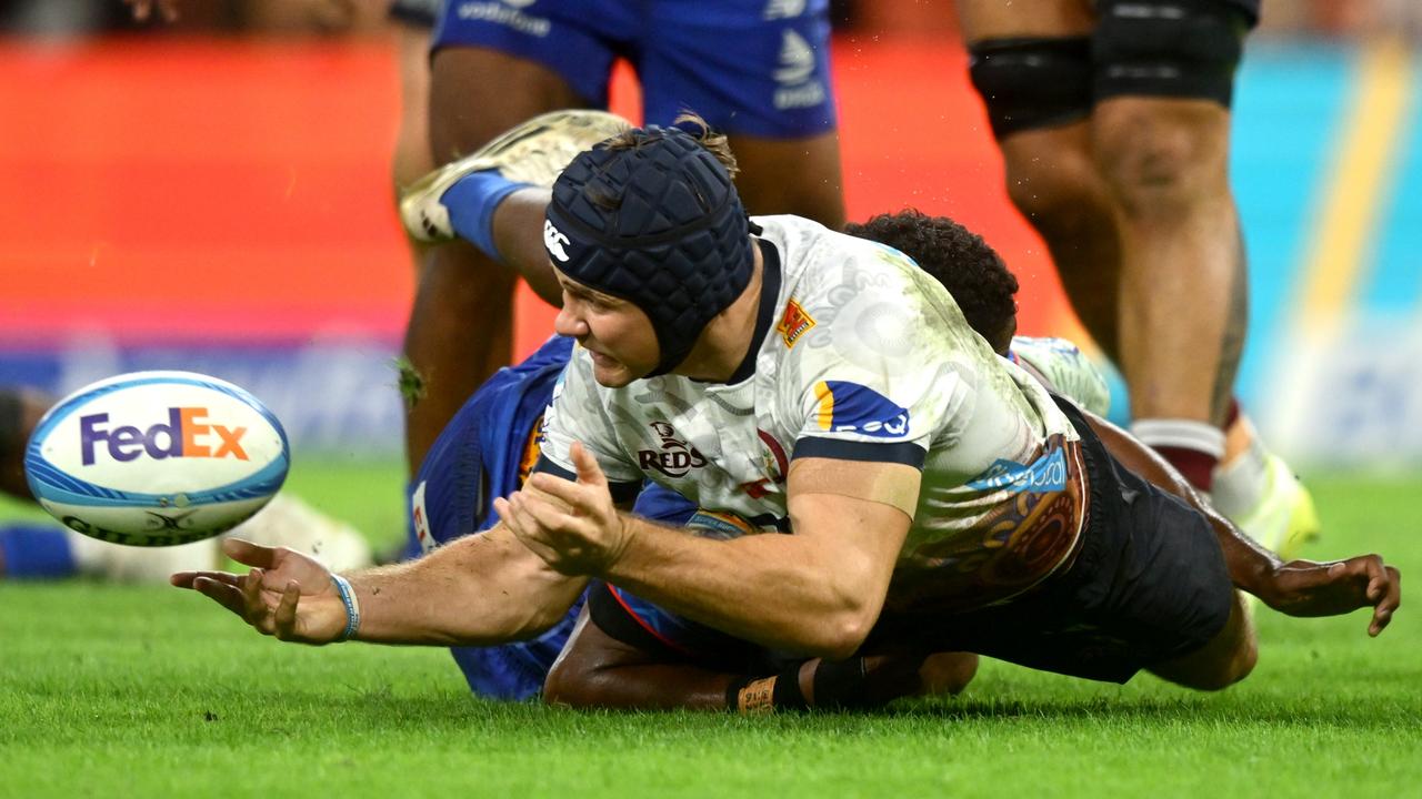 Departing centre intent on tasting glory with Reds