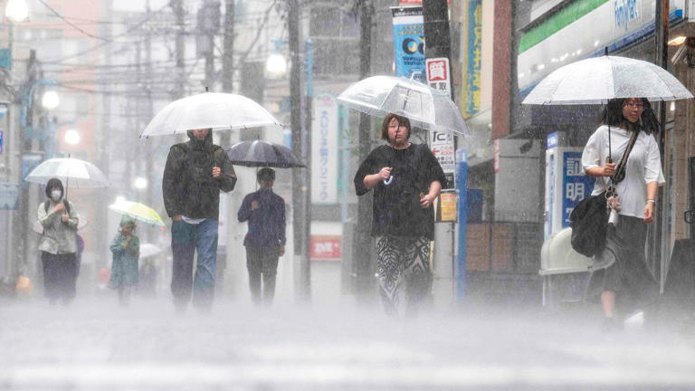 Tropical storm Jangmi disrupts transport and leaves 60,000 homes ...