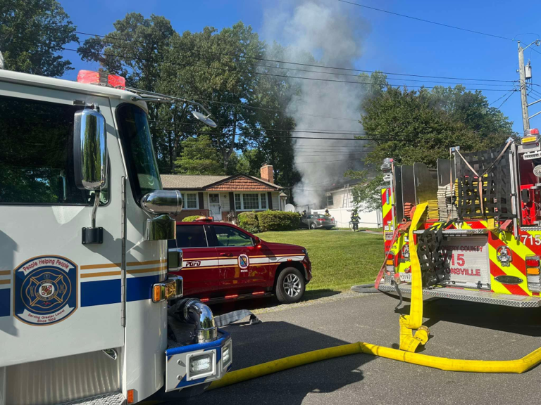 Four displaced in Laurel house fire