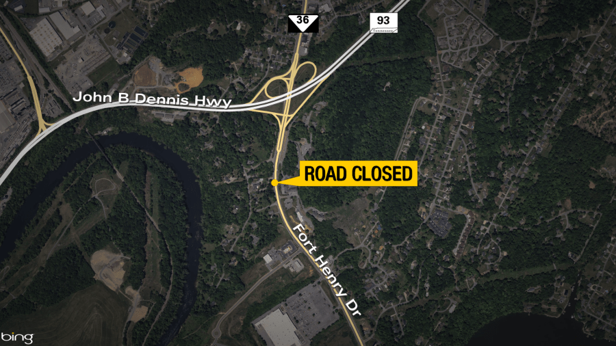 Crash, downed power lines shut down Fort Henry Drive