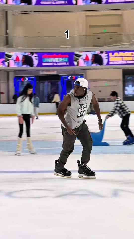 Watch skaters perform perfect backward moves on ice