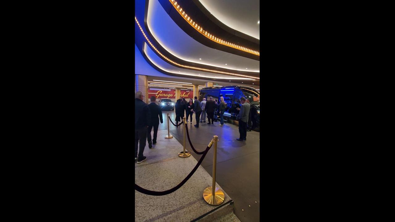 College Football Playoff Committee members greeted by UNLV band at ...