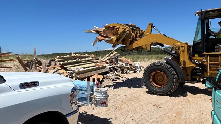 Debris removal underway following last night’s Buxton beach house collapse