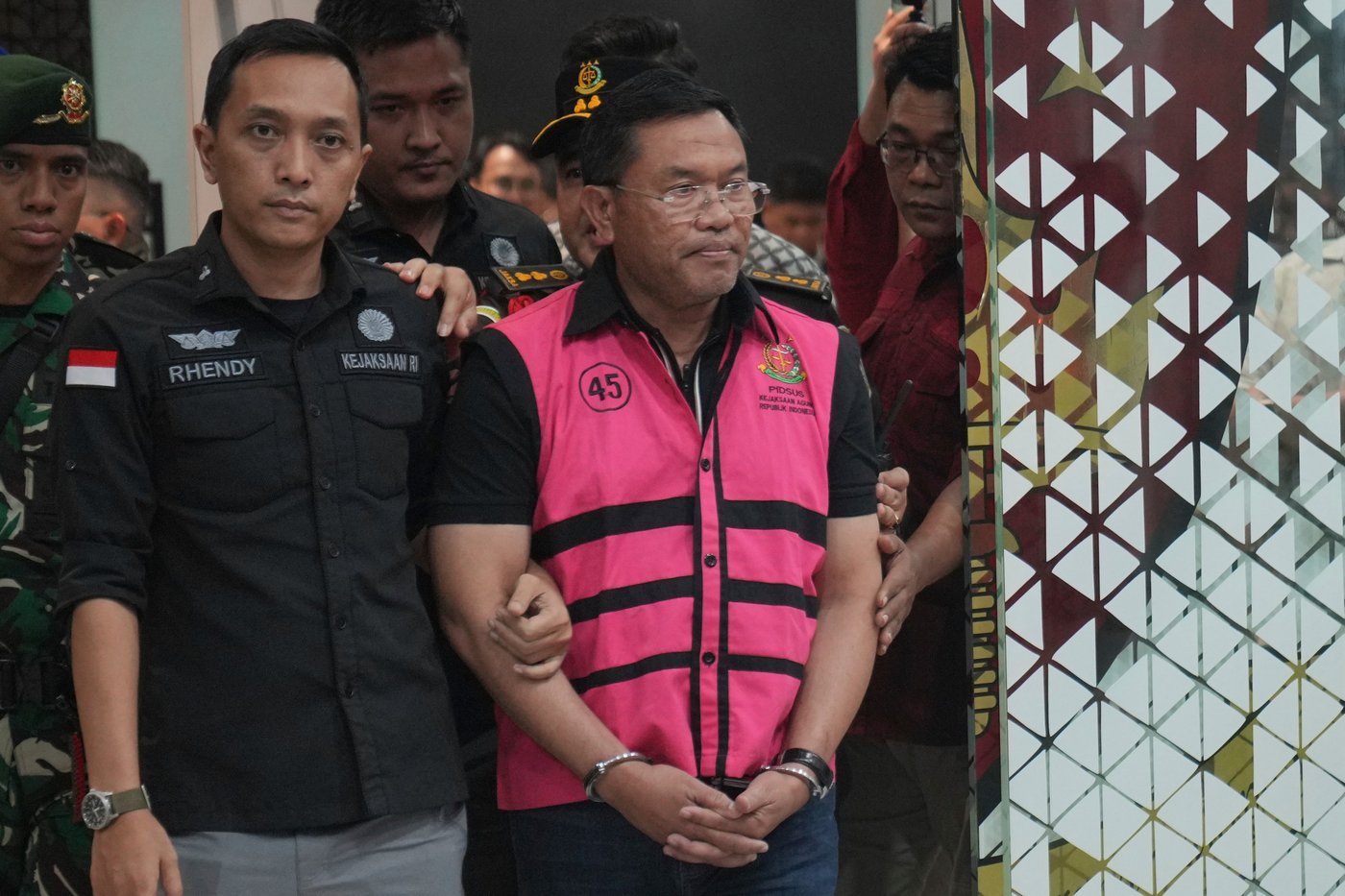 Indonesia arrests former nutrition agency head and officials in ...