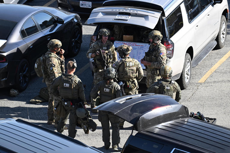 Suspect who took 10 people hostage in California standoff has been shot ...