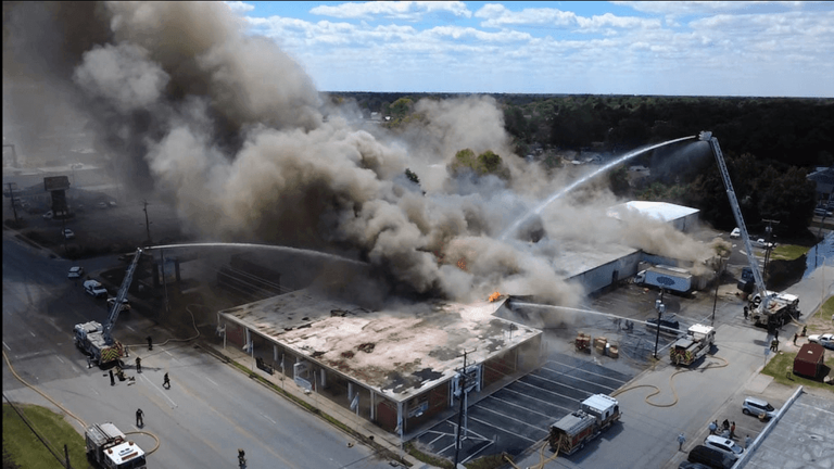 Jacksonville Fire Department battles Furniture Plus blaze; police ...