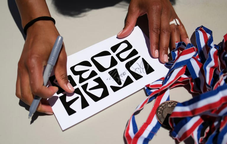 Surprise! Olympians, Paralympians show up at school’s field day