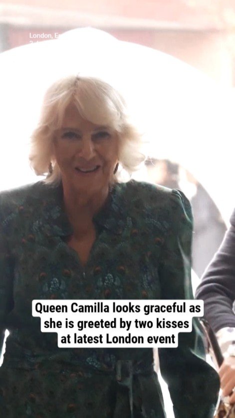 Queen Camilla looks graceful as she is greeted by two kisses at latest ...
